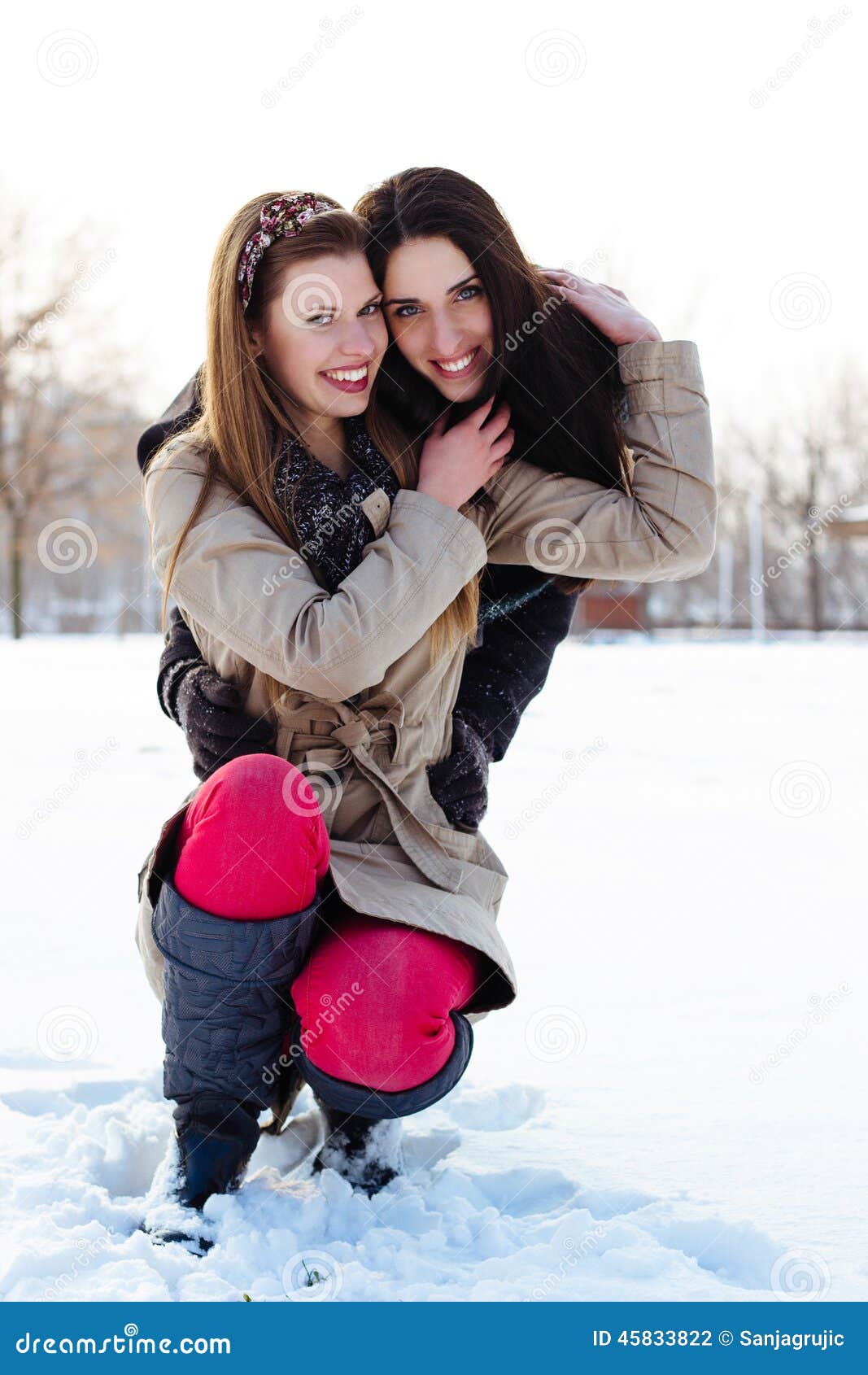 Two Best Friends Hugging in the Snow Stock Photo - Image of friends ...