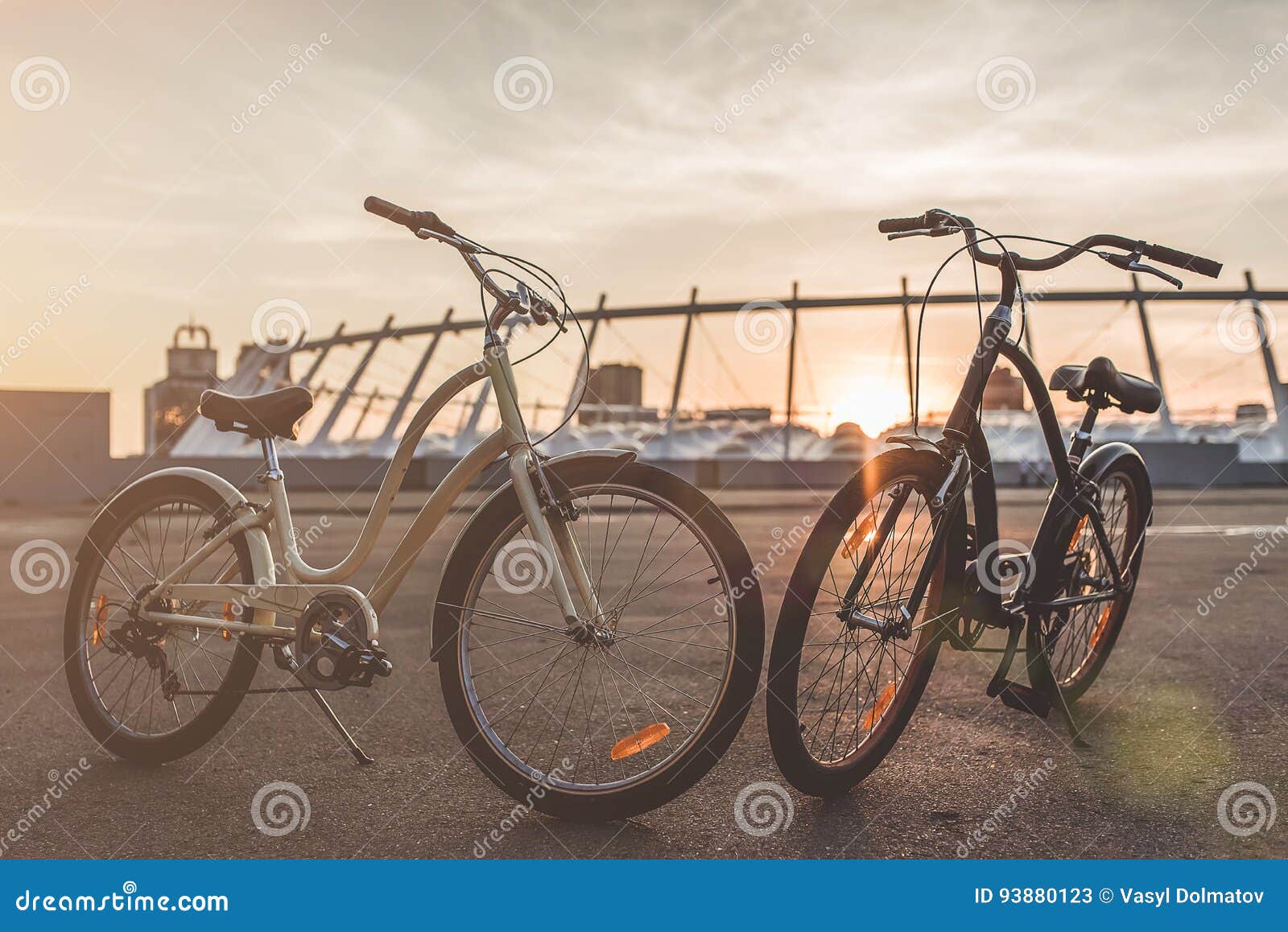 Two Bicycles in the City on the Sunset Stock Image - Image of light ...