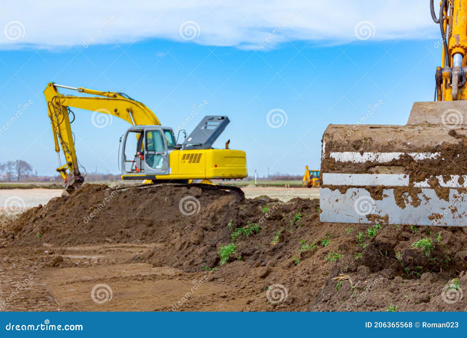 Two Big Excavators are Leveling Ground on Building Site Stock Photo ...