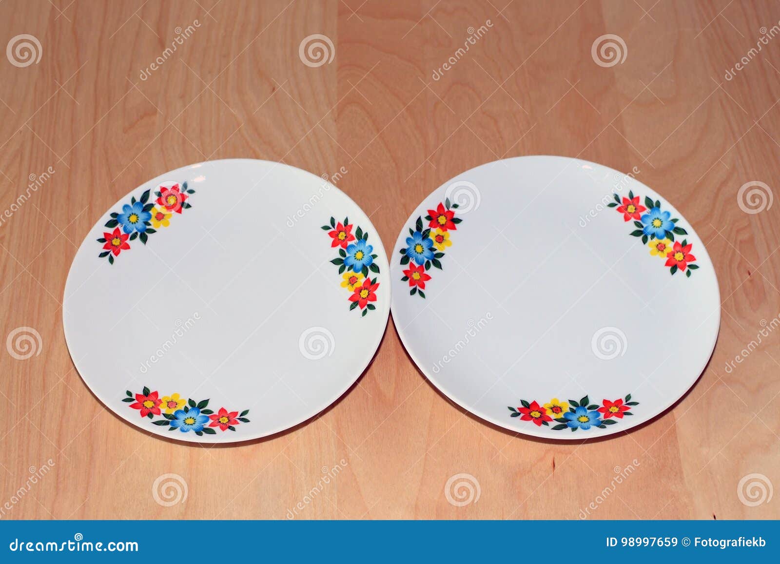 Two Big Plates on a Wooden Table Stock Image - Image of brown, dish ...