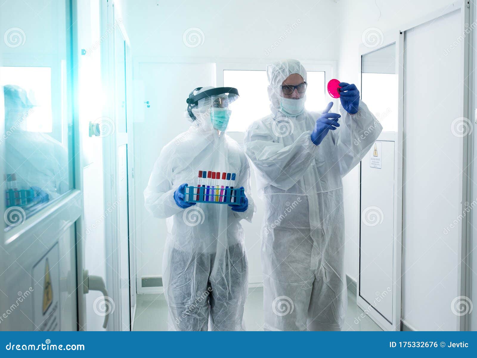 Biologist Carrying Samples in Protective Suits Stock Photo - Image of ...