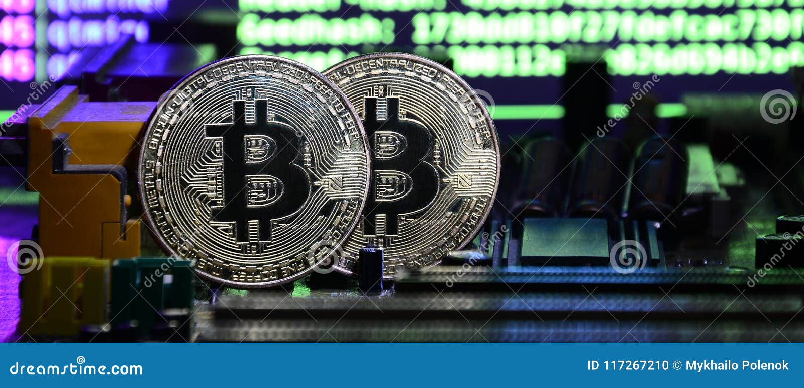 Two Bitcoins Lies on a Videocard Surface with Background of Screen ...
