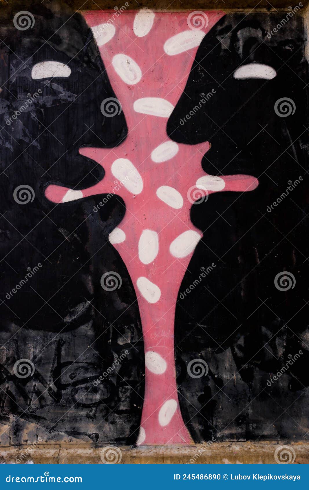 Two Black Faces on a Pink Background. Abstract Graffiti on a Concrete ...