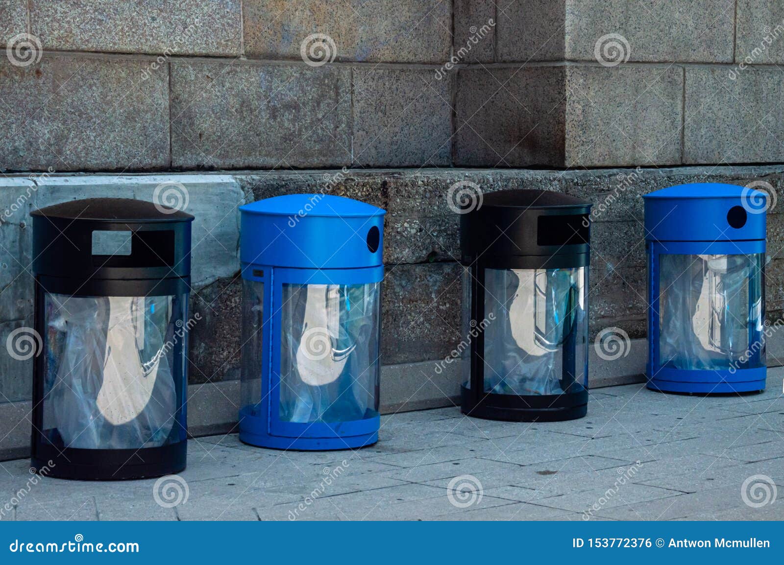 A Blue Recycle On A White Background With Plastic Bottles And Cardboard ...