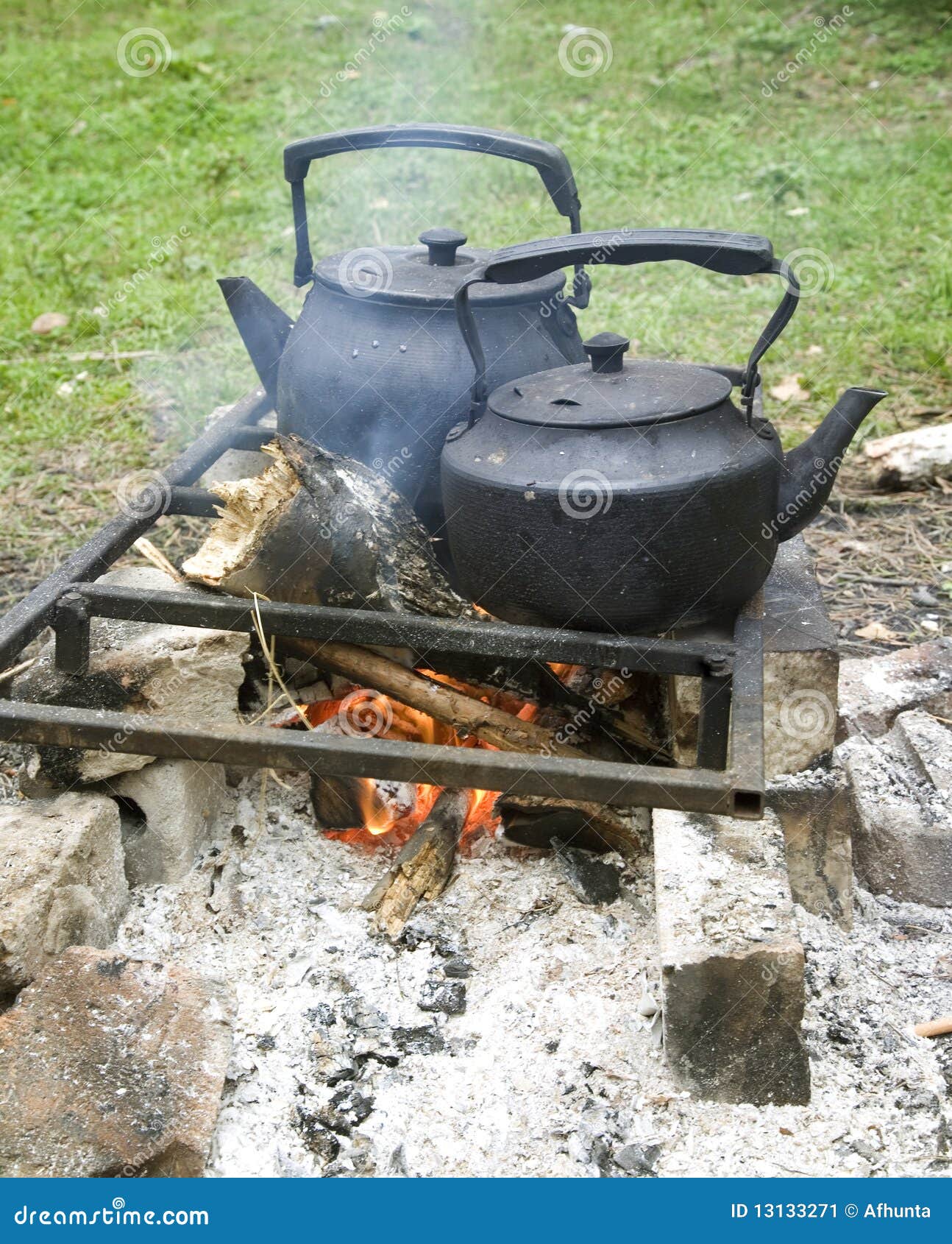 Black Kettle On Bricks To Boil Water And Make Tea In A Village In The ...