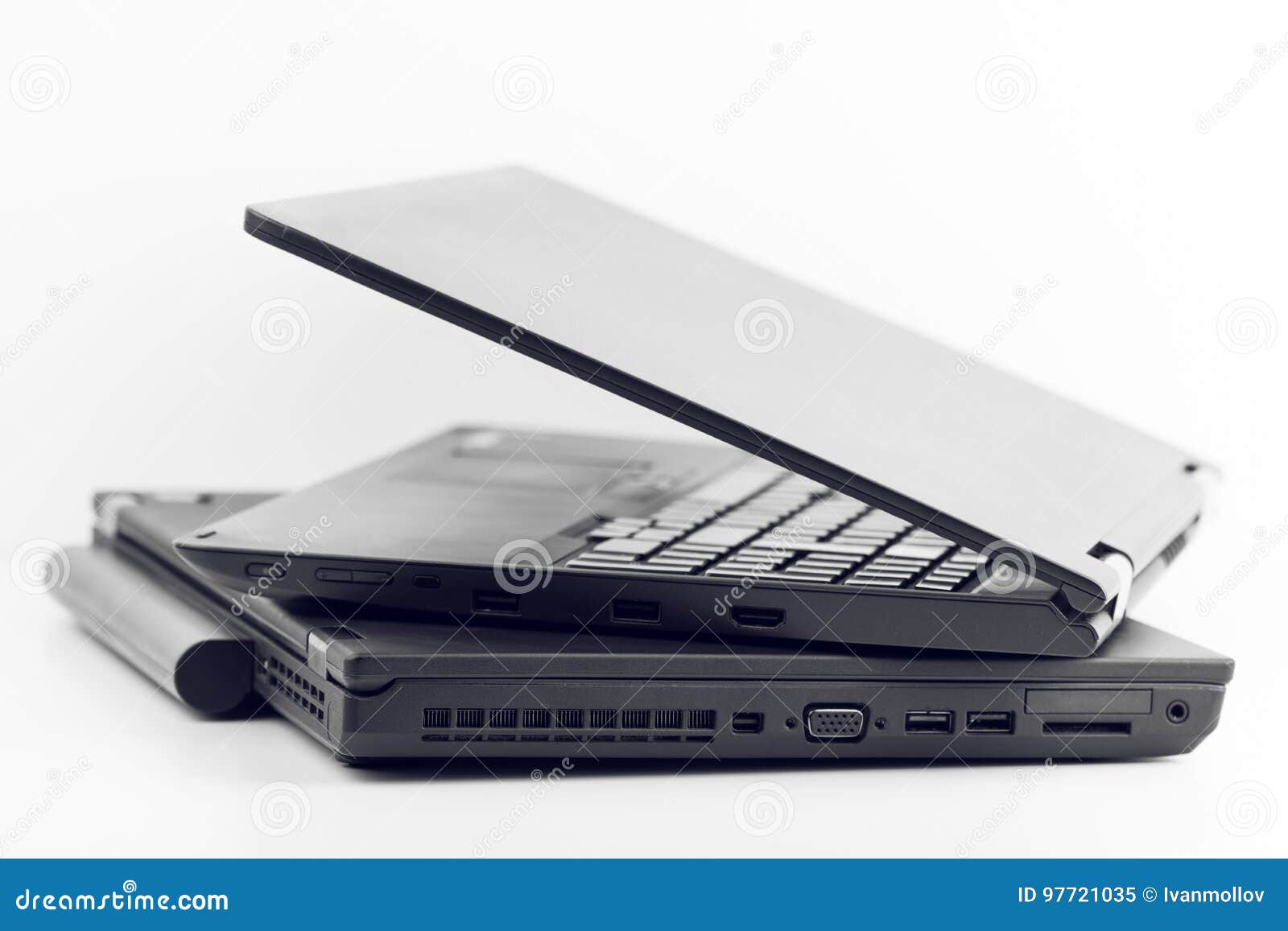 Two Black Laptops One Over Another Stock Image - Image of isolated ...