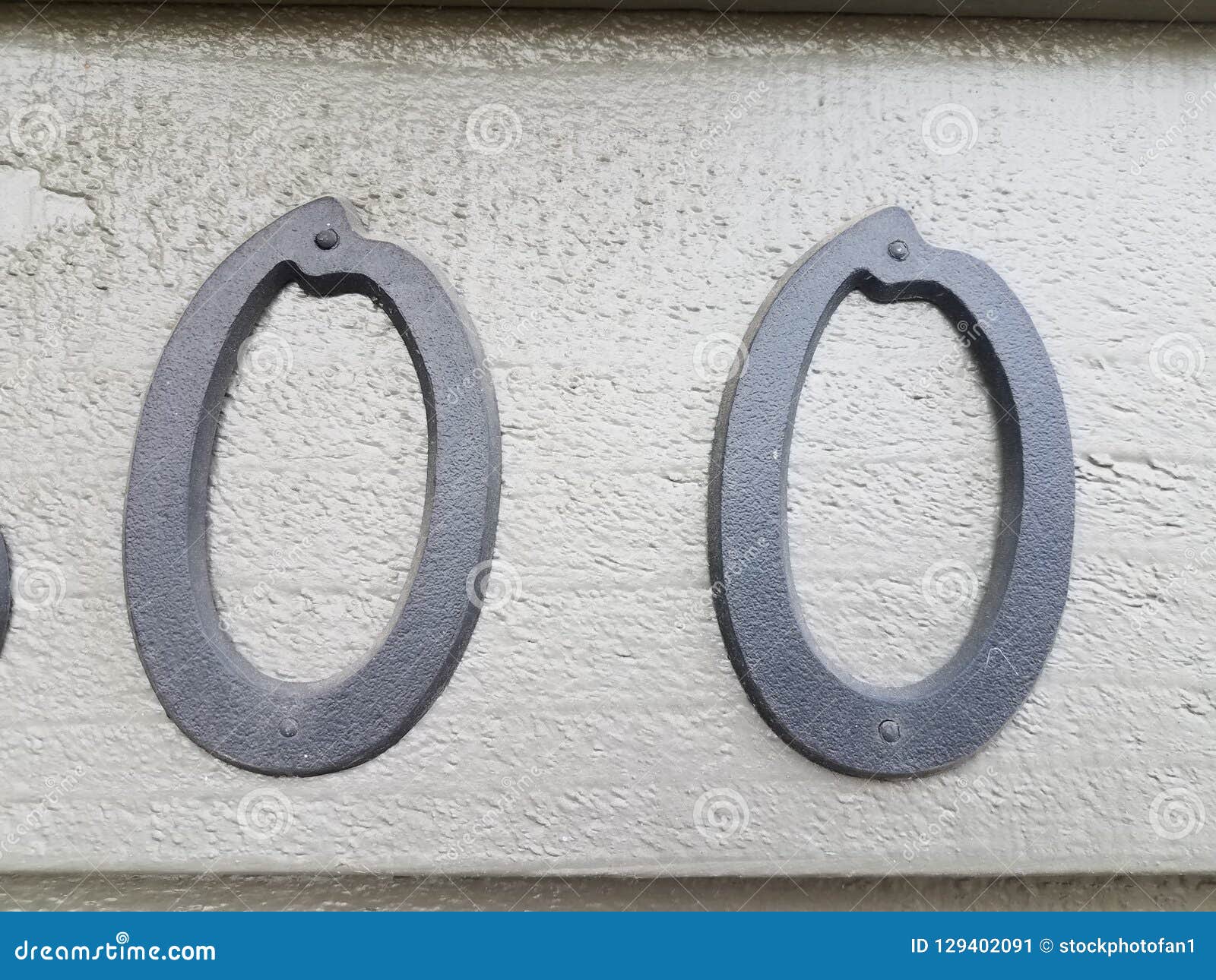 Two Black Number Zero on Grey Paint Stock Image - Image of number ...