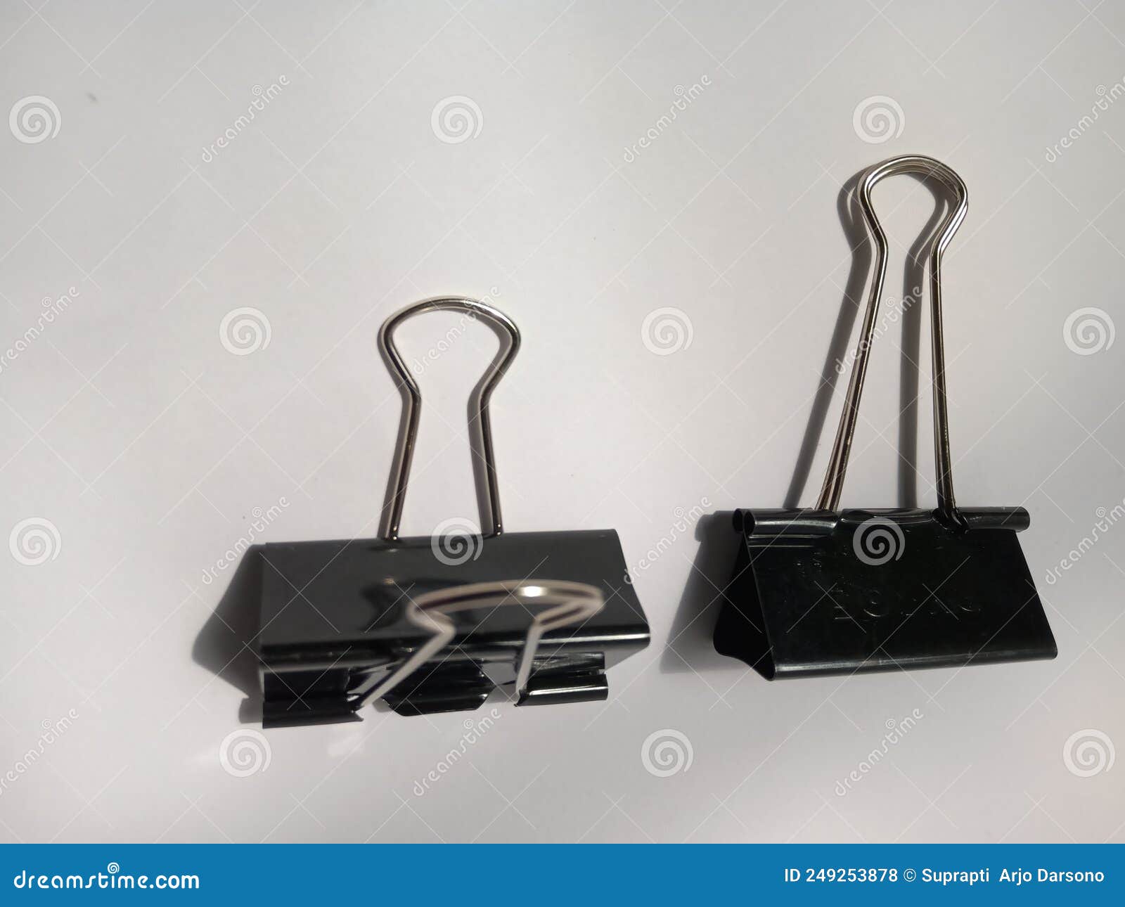 Two Black Paper Clips, Plain White Background For Design Stock Photo ...