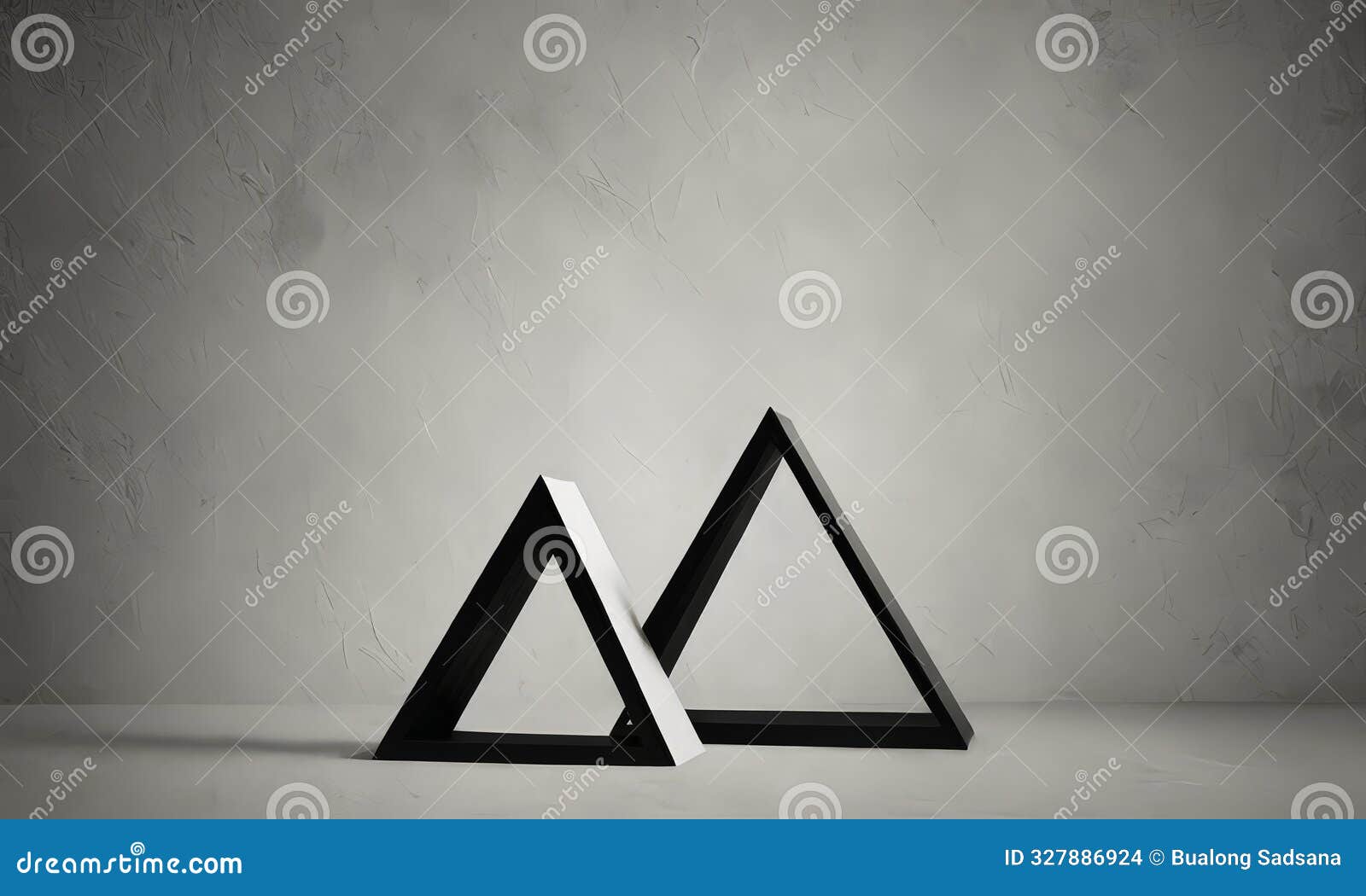 Two Black Triangular Sculptures Stand in Minimalist Black and White ...