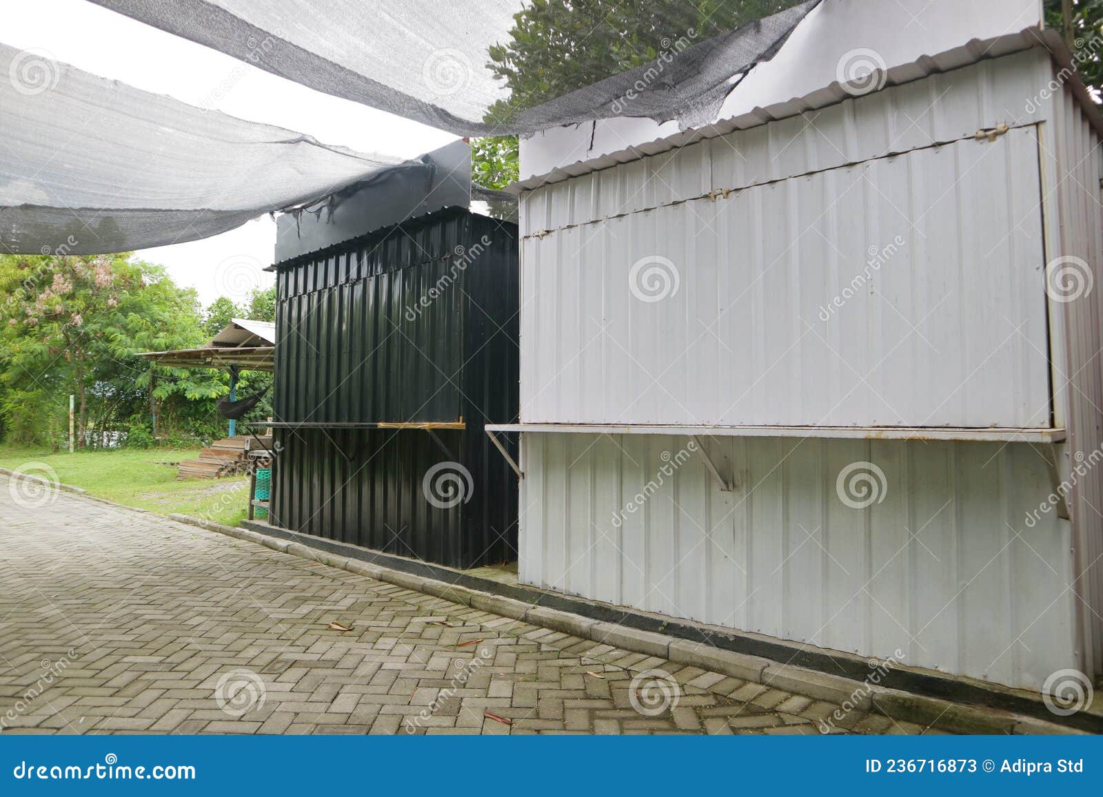 Two Black and White Stall Containers Stock Image - Image of shelf ...