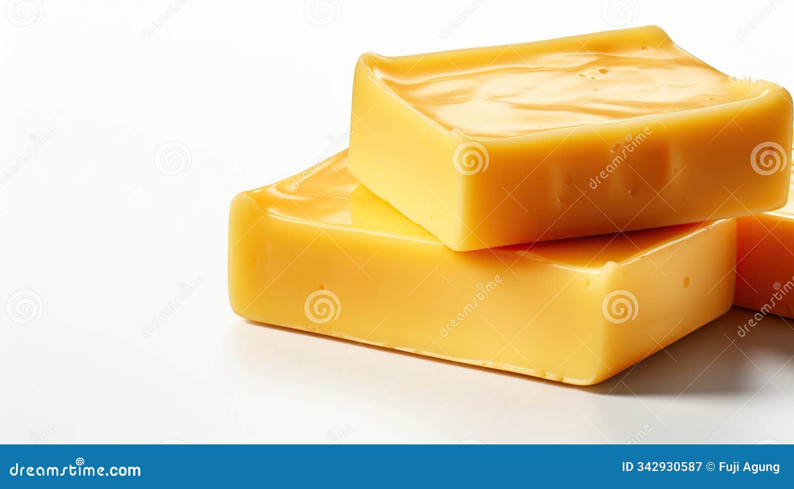 Two Blocks of Processed Cheese Stacked on Top of Each Other on a White ...
