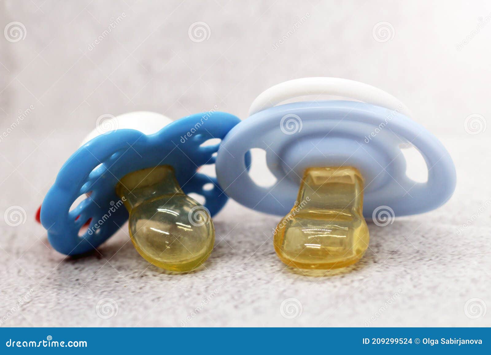 Two Blue baby pacifiers stock photo. Image of suck, comforter - 209299524