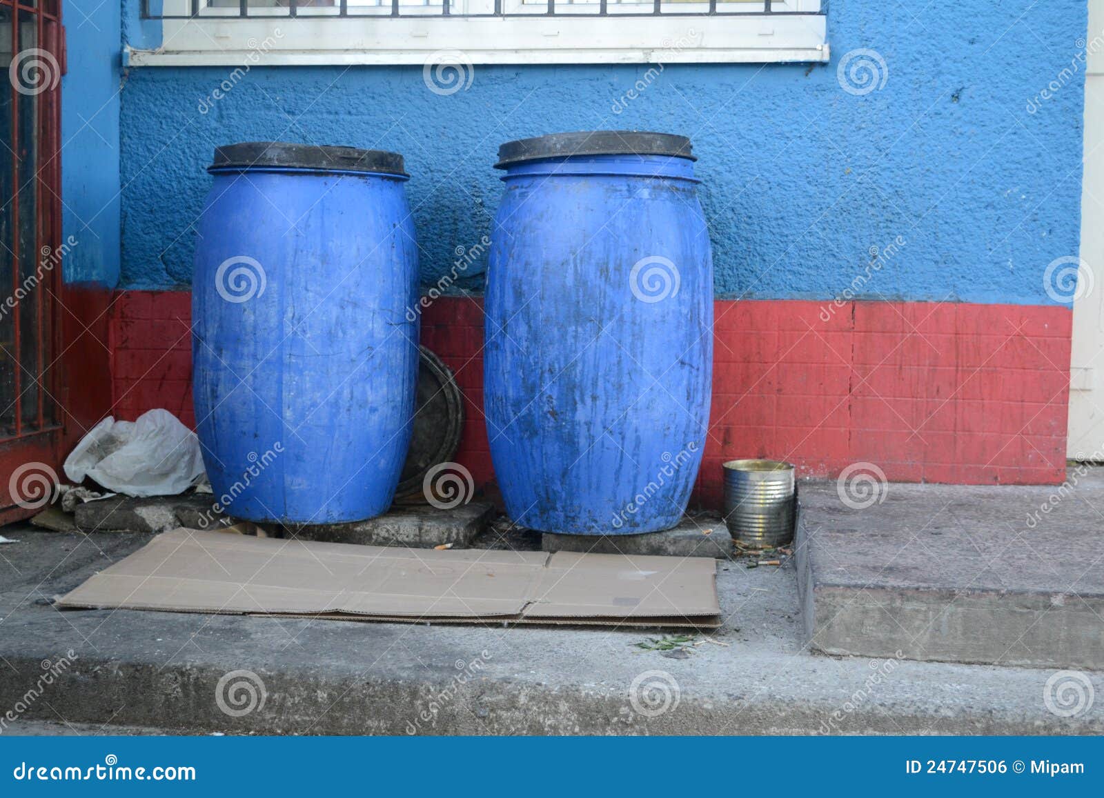 Two Blue Barrels in Backyard Stock Photo - Image of plastic, deck: 24747506