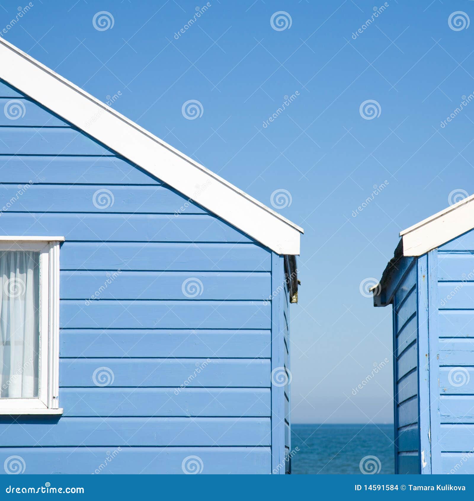Two blue beach huts stock photo. Image of recreation - 14591584