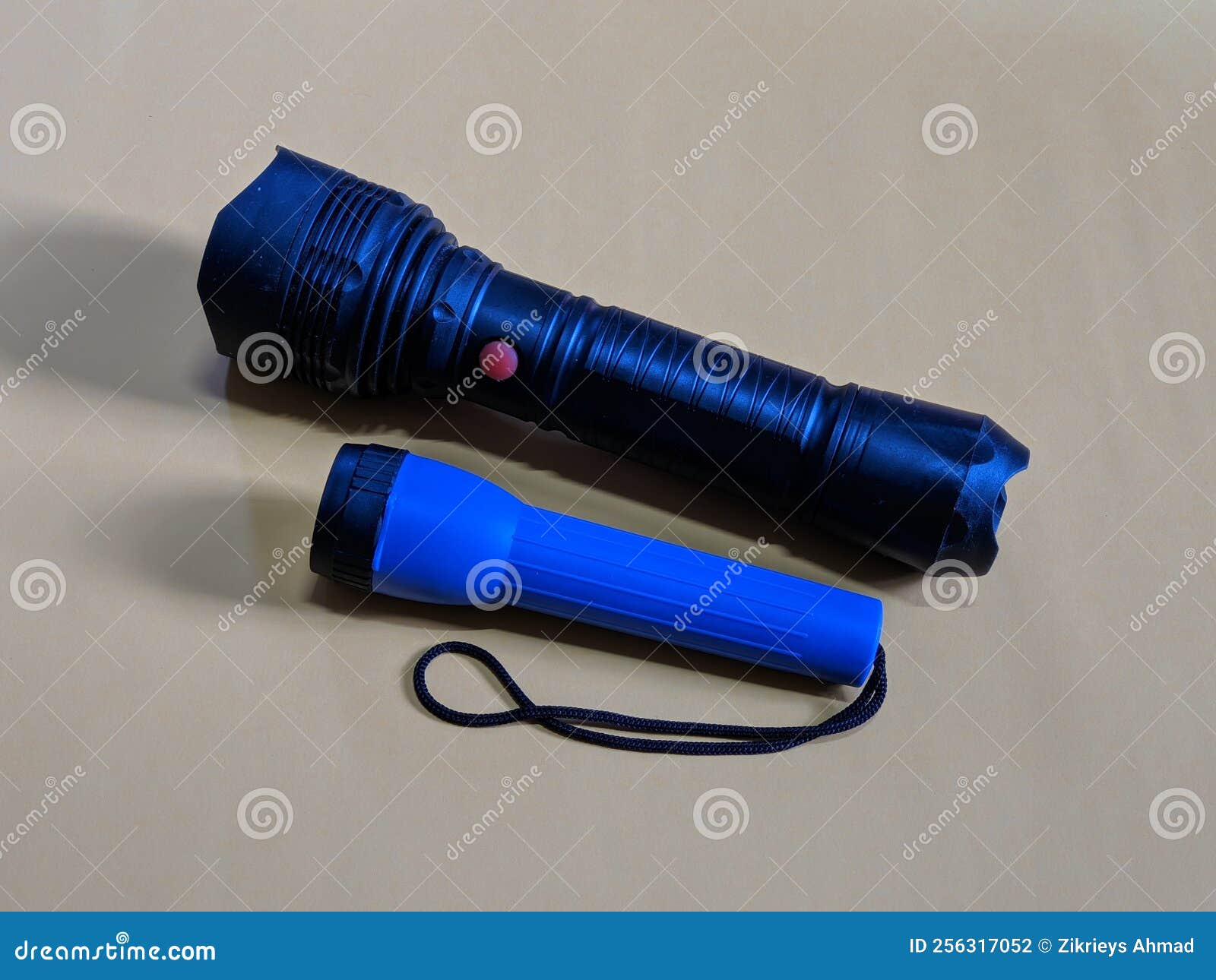 Two Blue and Black Torchlight on Orange Background Stock Photo - Image ...