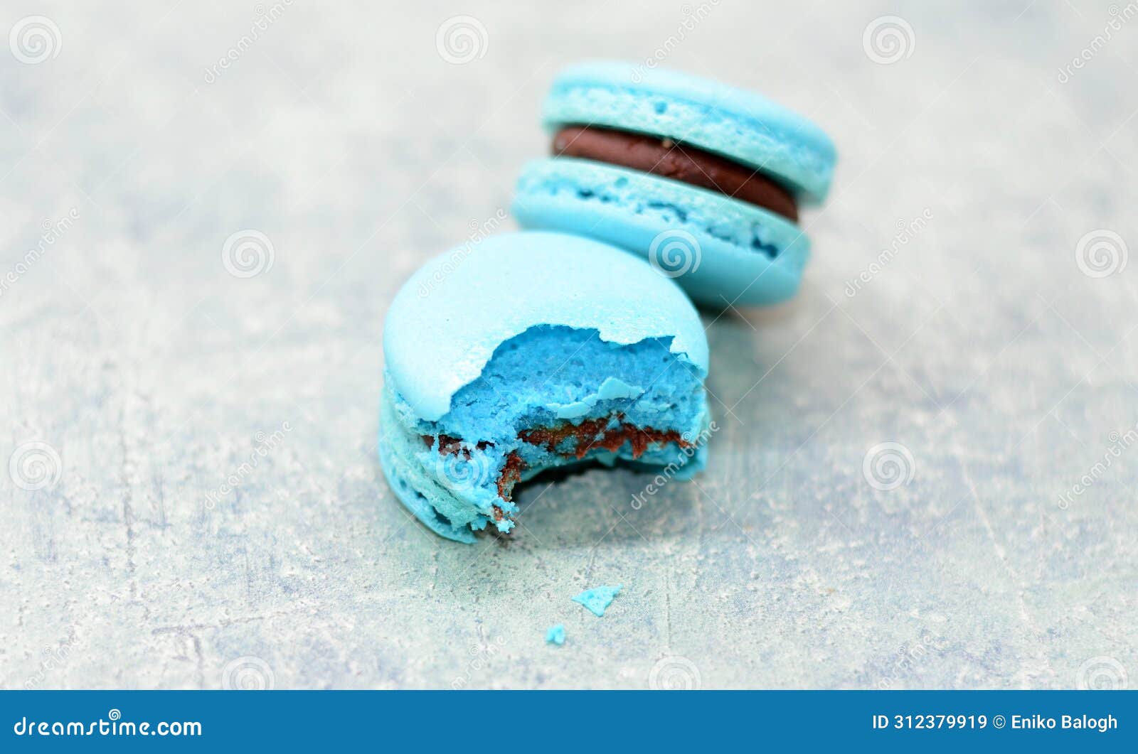 Two Blue Macarons One Bitten with Chocolate Stock Image - Image of ...
