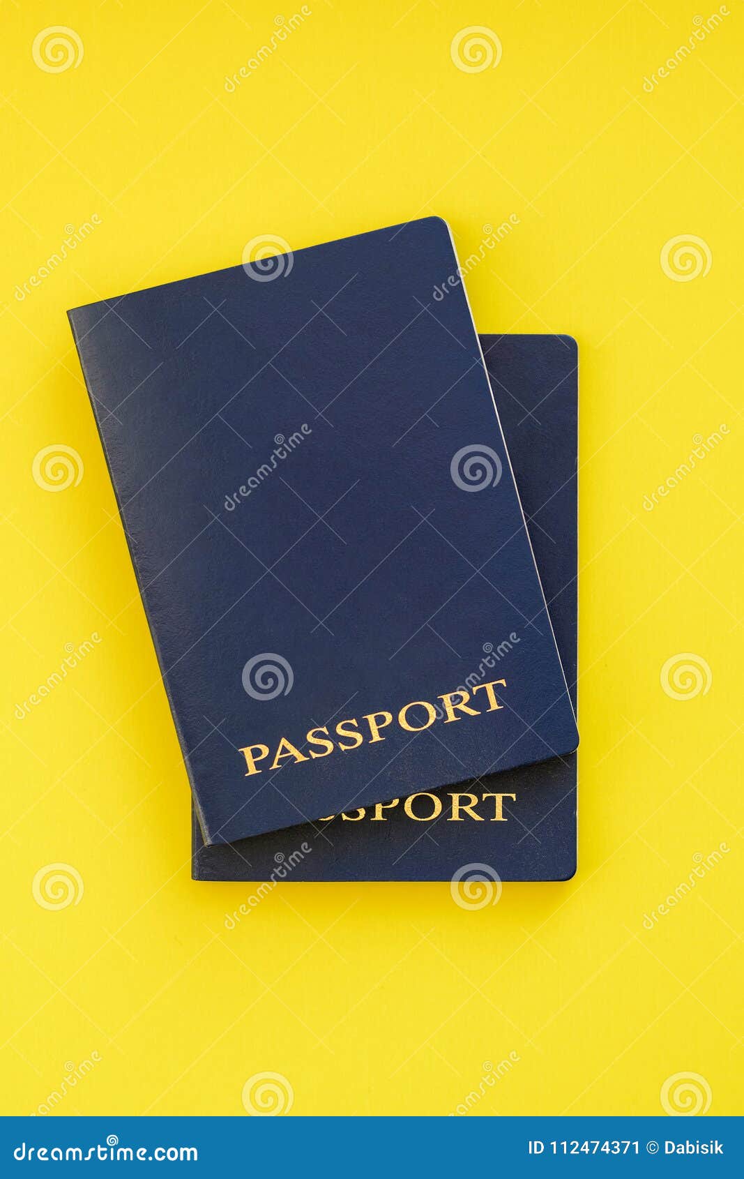 Two Blue Passports on a Yellow Background Stock Image - Image of ...