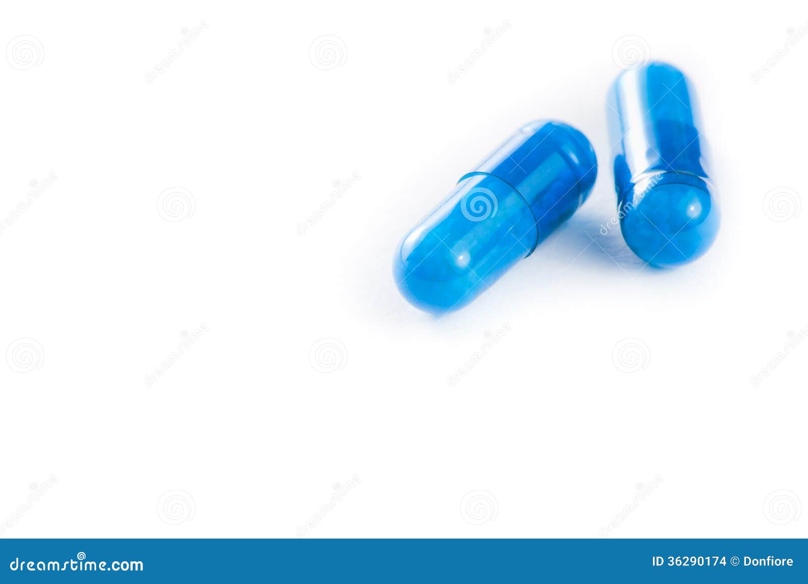 Two Blue Pills Isolated with Space for Text Stock Photo - Image of ...
