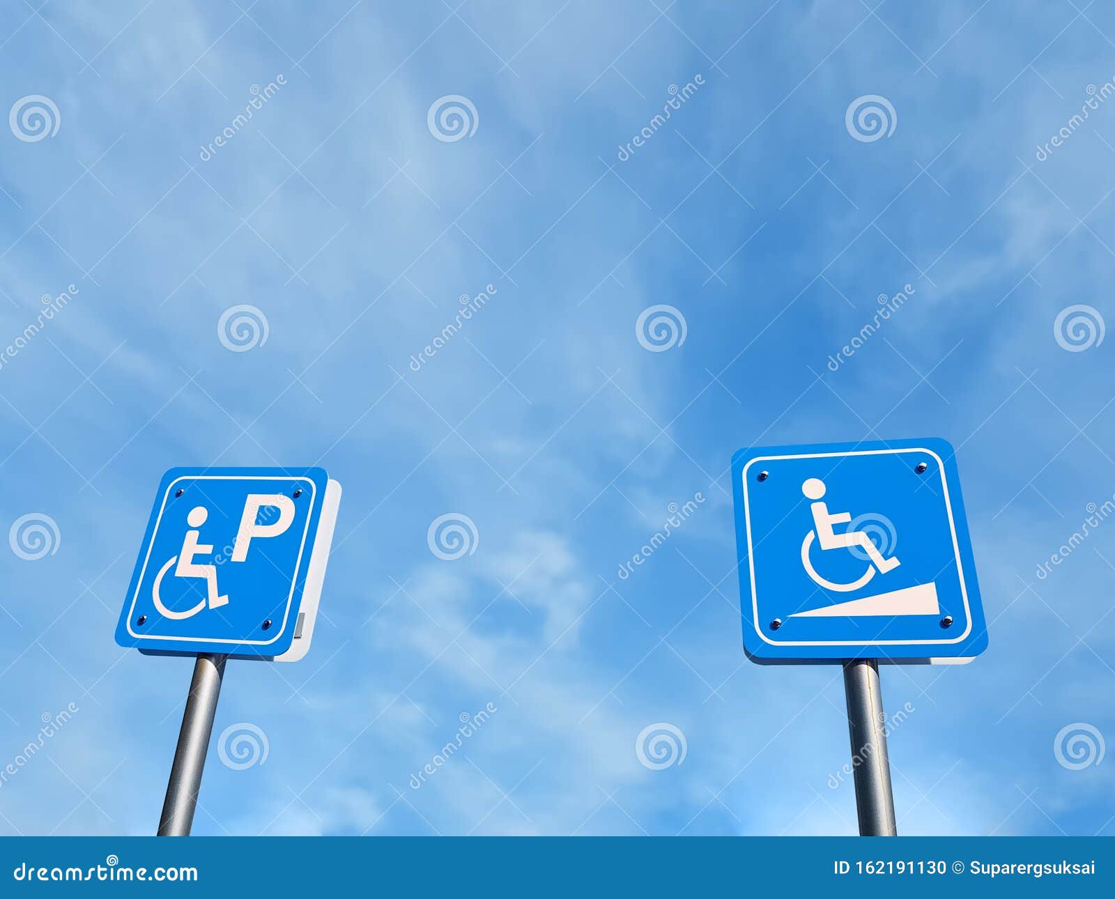 Two Blue Reserved Handicap Parking Signs Against Blue Cloudy Sky Stock ...
