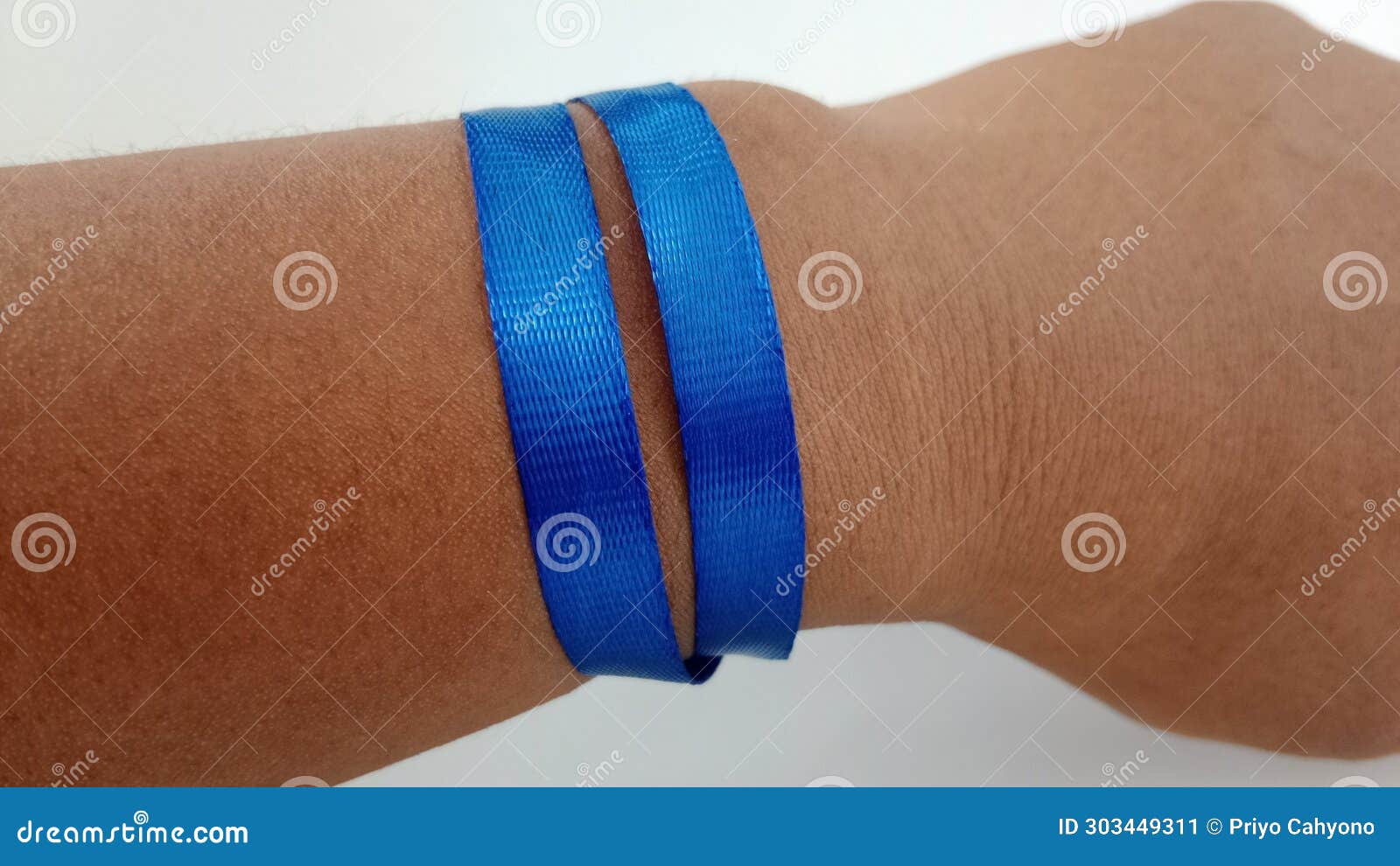 Two Blue Ribbons on the Arm on a White Background Stock Image - Image ...