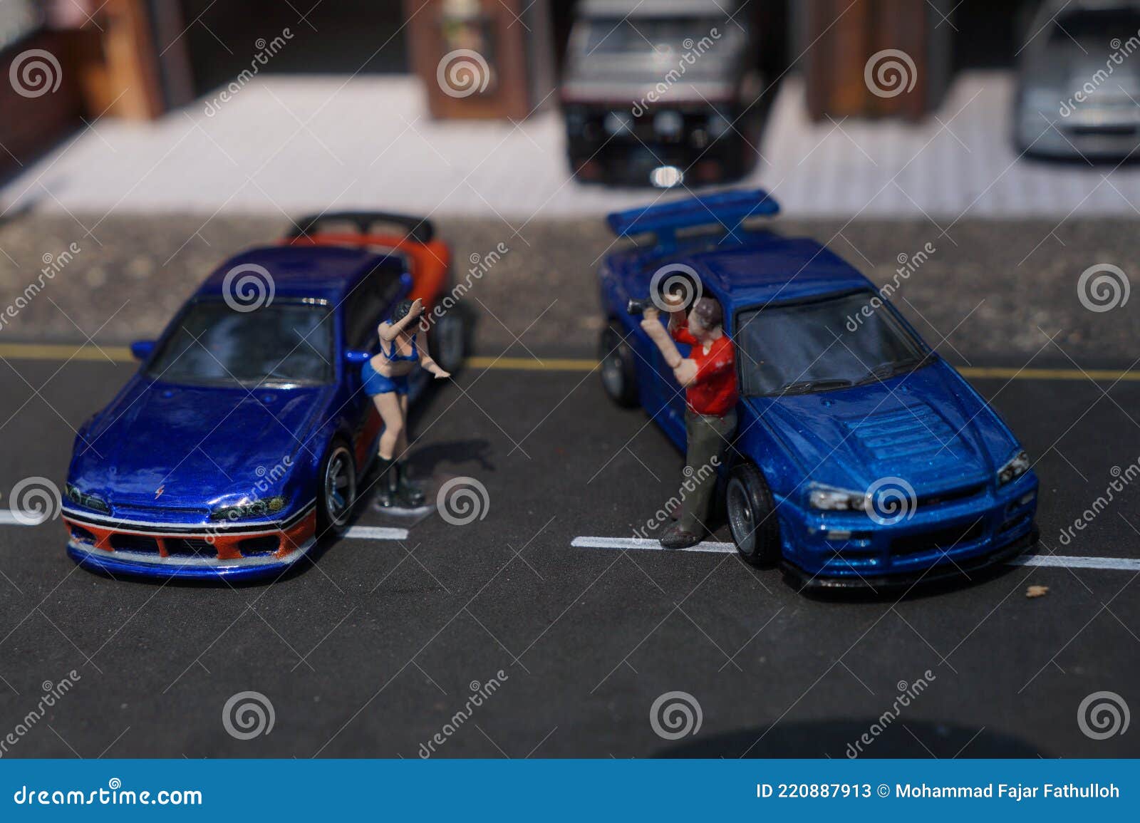 Two blue toy car stock image. Image of vehicle, racetrack - 220887913