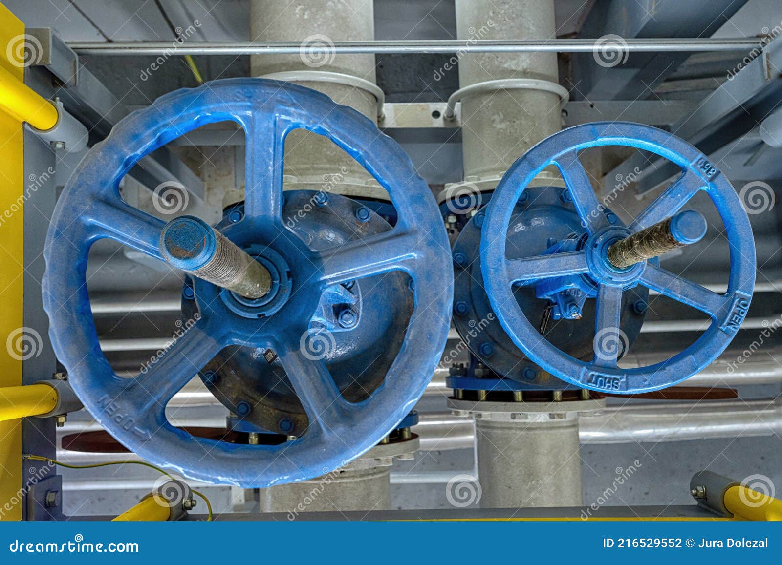 Two Blue Valves with Valve Control Wheel with Part of Pipeline in the ...
