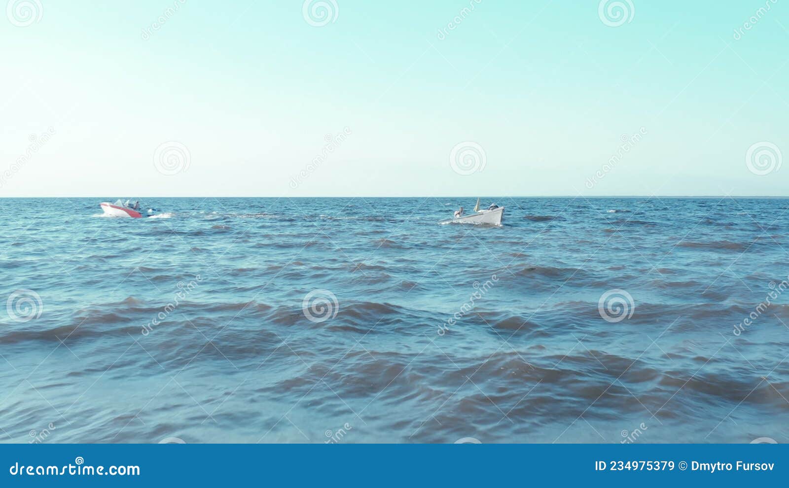 Two Boats Float in Different Directions in the Sea on the Waves. Stock ...