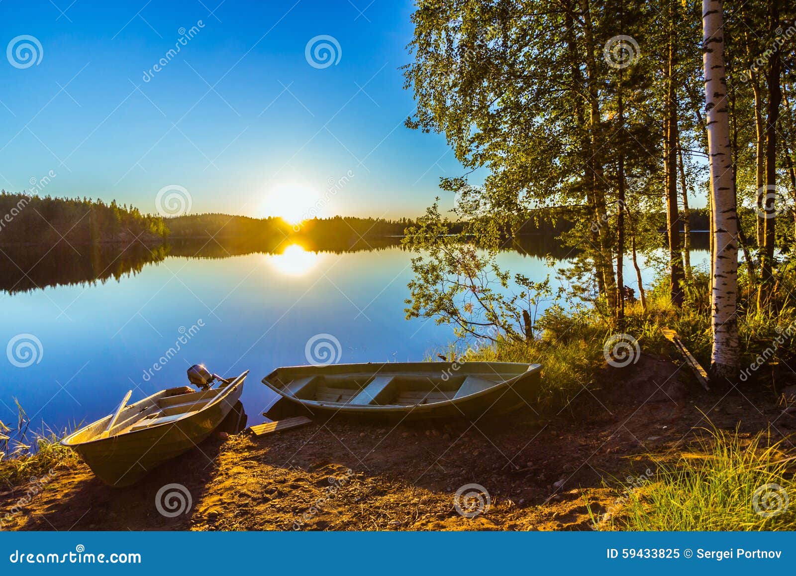 Two boats on a lake shore stock image. Image of lake - 59433825