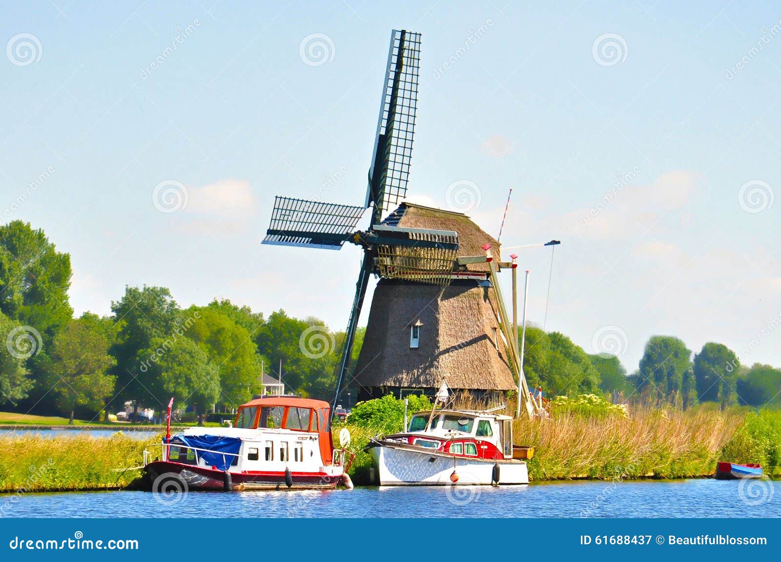 Two boats and windmill stock image. Image of boat, power - 61688437