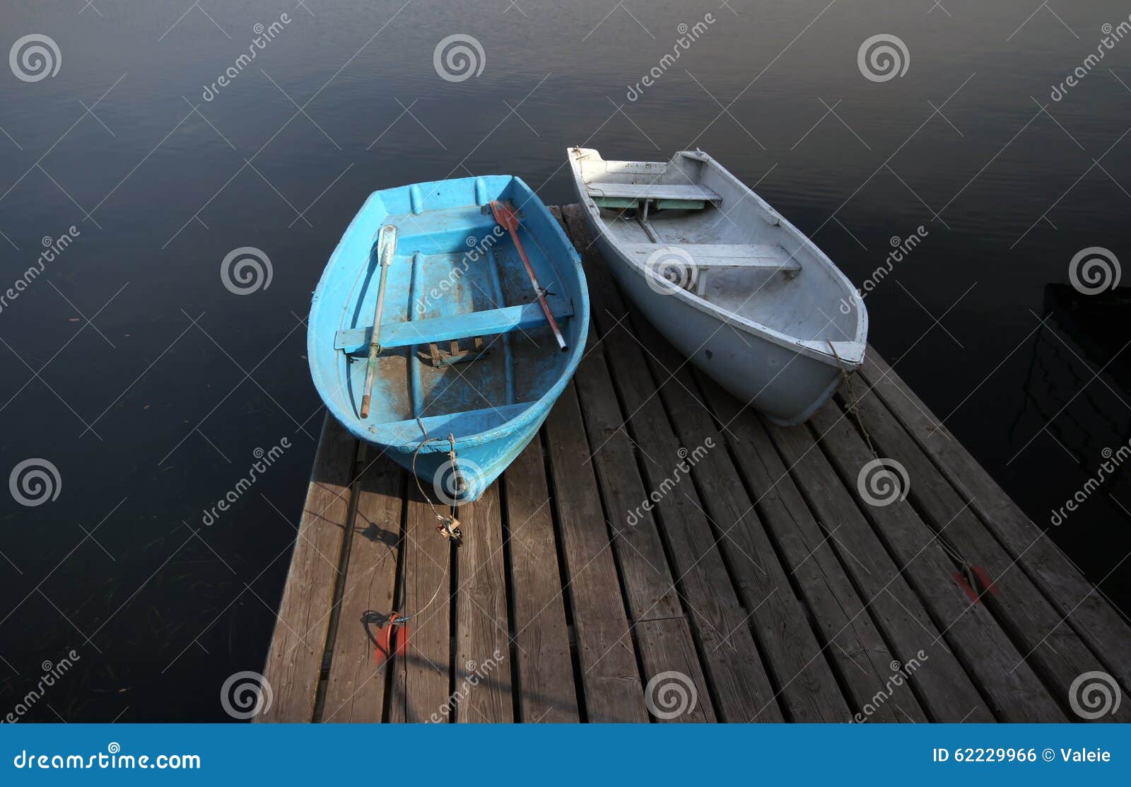 Two boats on wooden berth stock photo. Image of jetty - 62229966