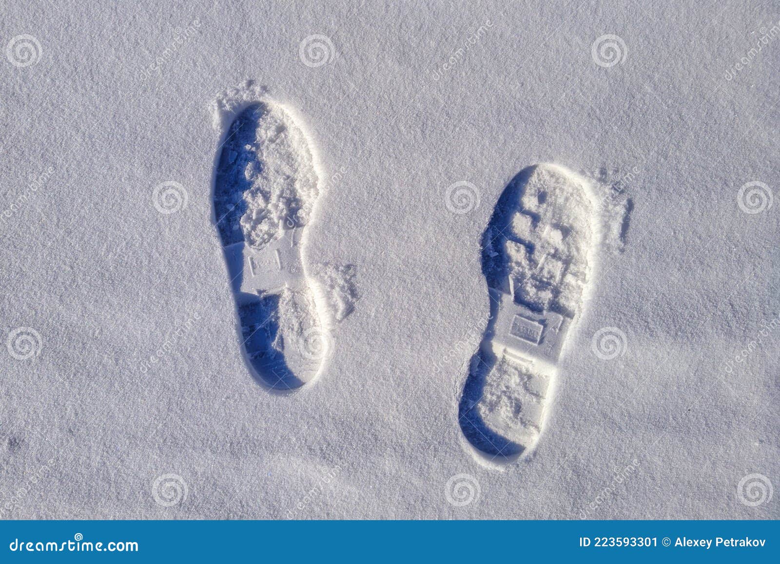Two Boot Prints on the Surface of the Snow Stock Image - Image of ...