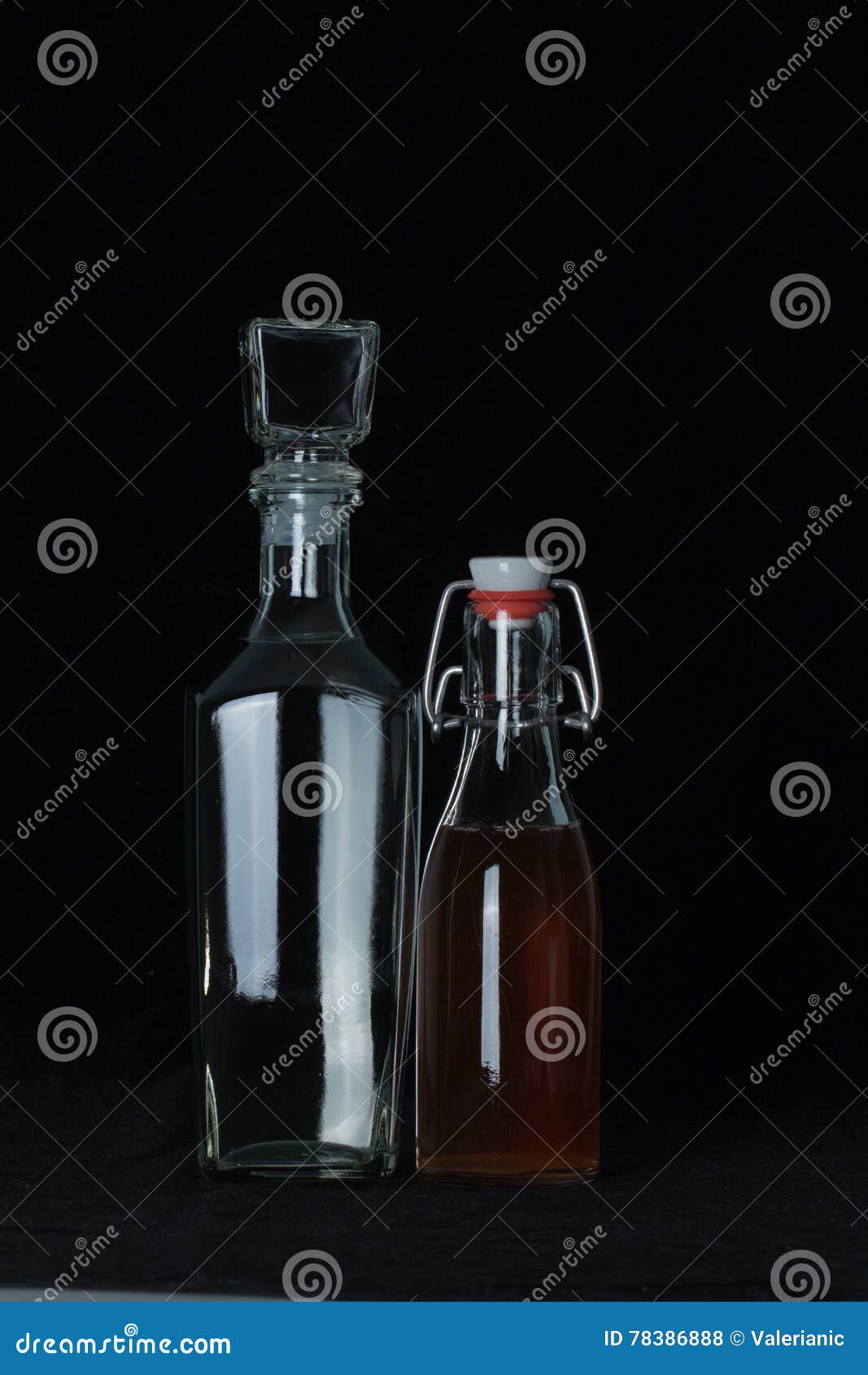 Two bottle on black stock photo. Image of liquid, drink - 78386888