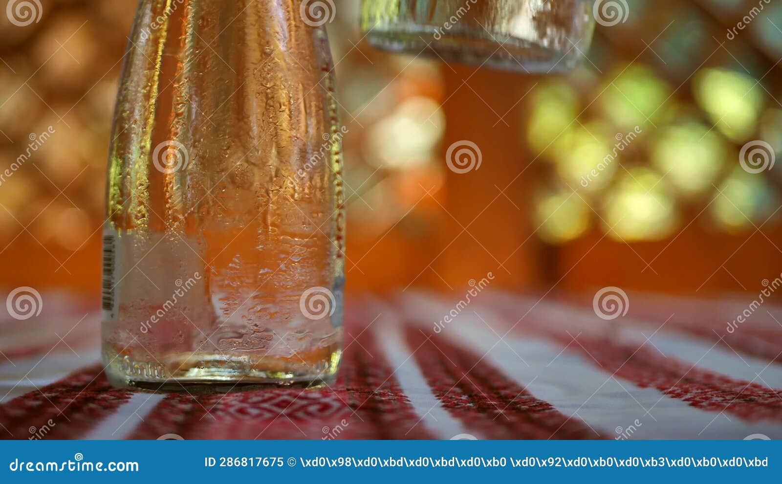 Two Bottles of Water are Cleared from the Table. Condensation on ...