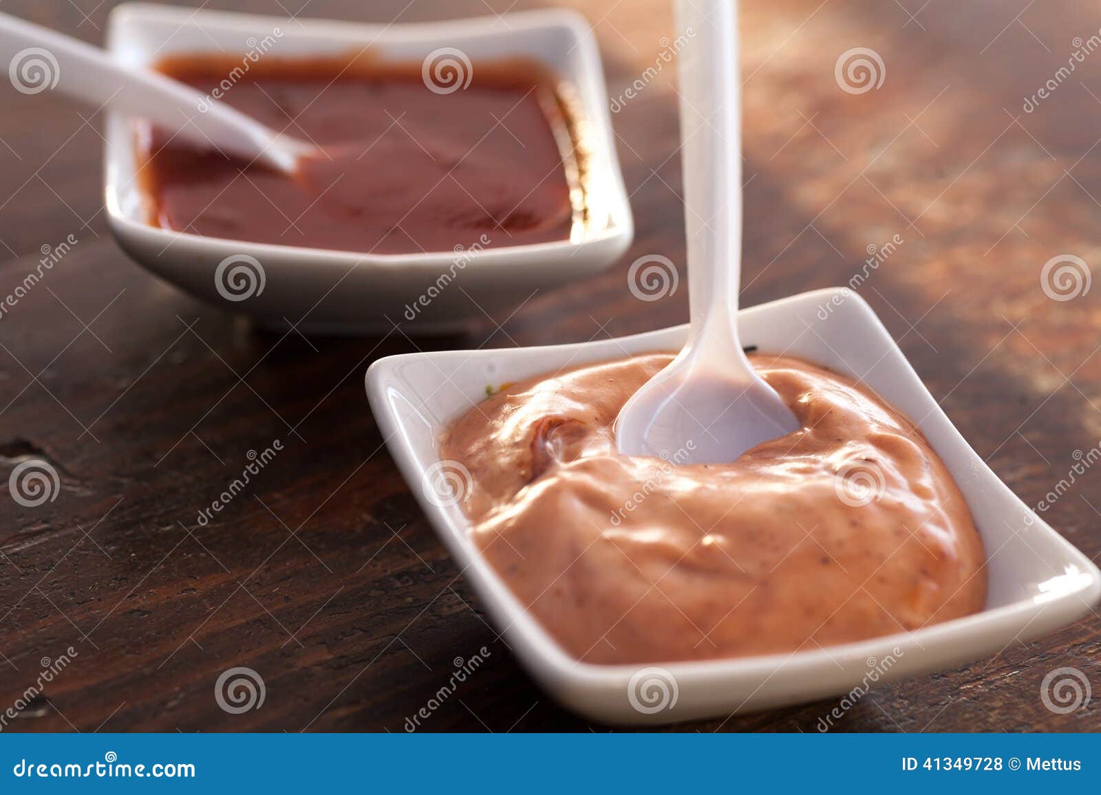 Two Bowls of a Delicious Sauce on a Table Stock Photo - Image of white ...