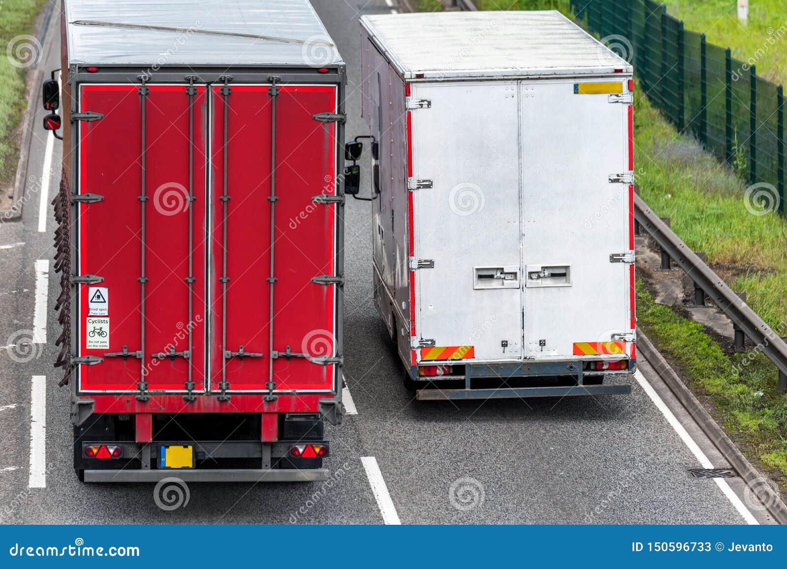 Two Box Lorry Trucks on Uk Motorway in Fast Motion Stock Image - Image ...