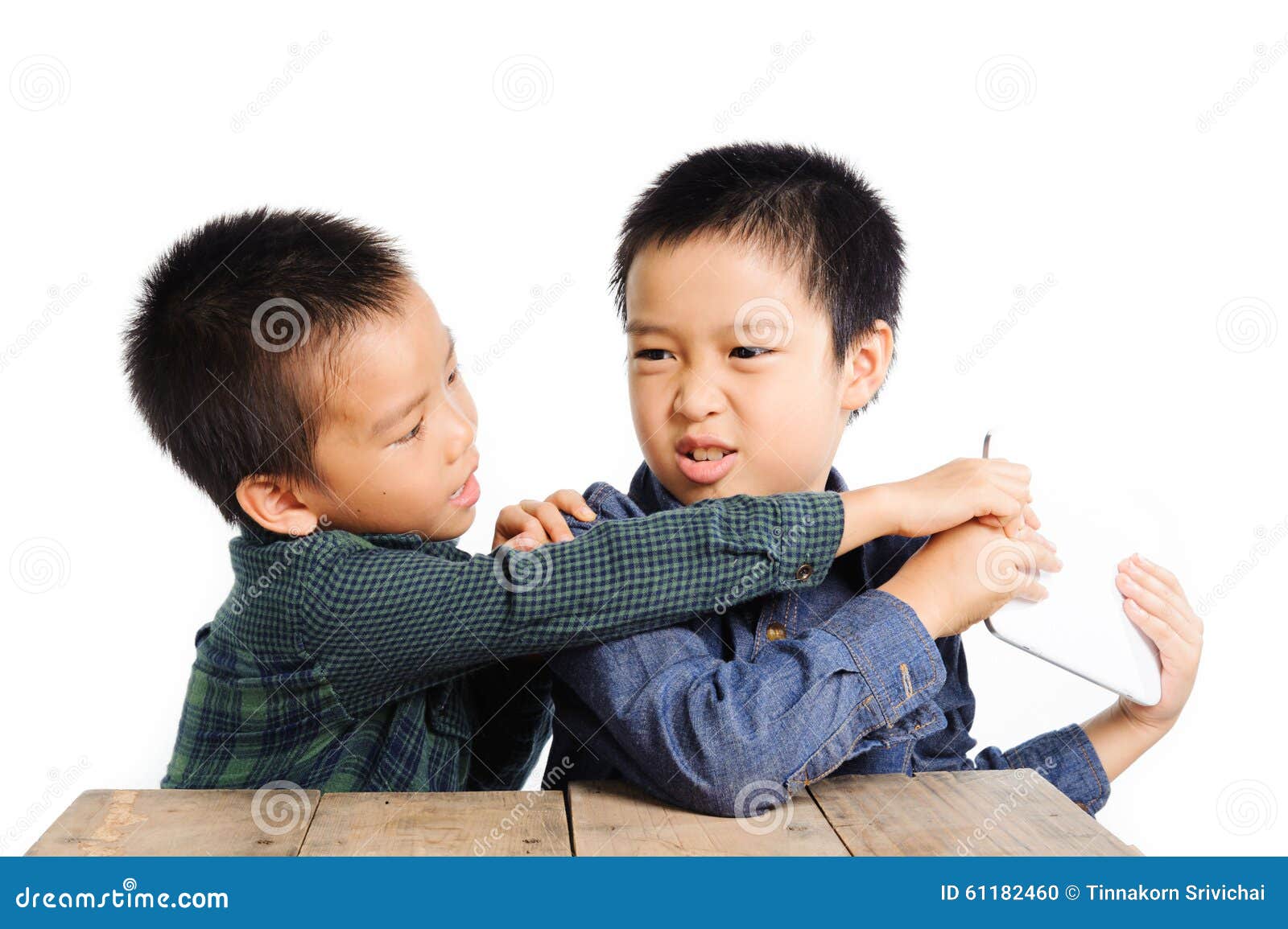 Two Boy Grab Competition To Get Tablet Device Stock Photos - Free ...