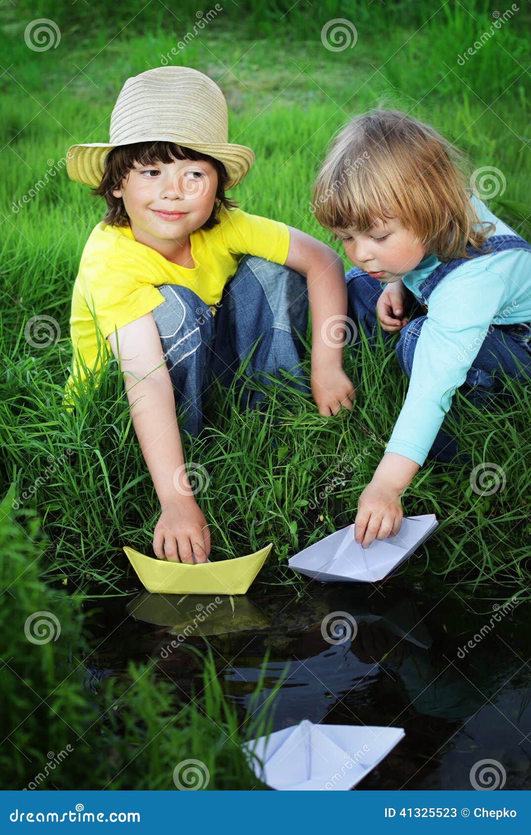 Two boy play in stream stock image. Image of blue, playing - 41325523