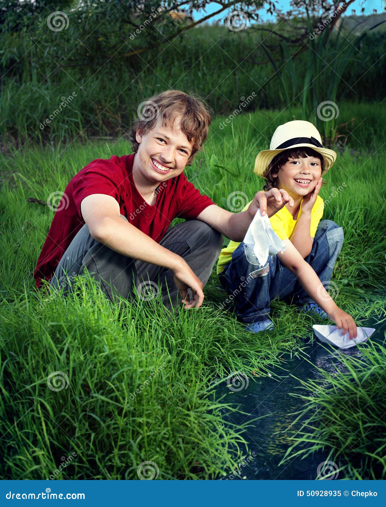 Two boy play in stream stock image. Image of color, caucasian - 50928935