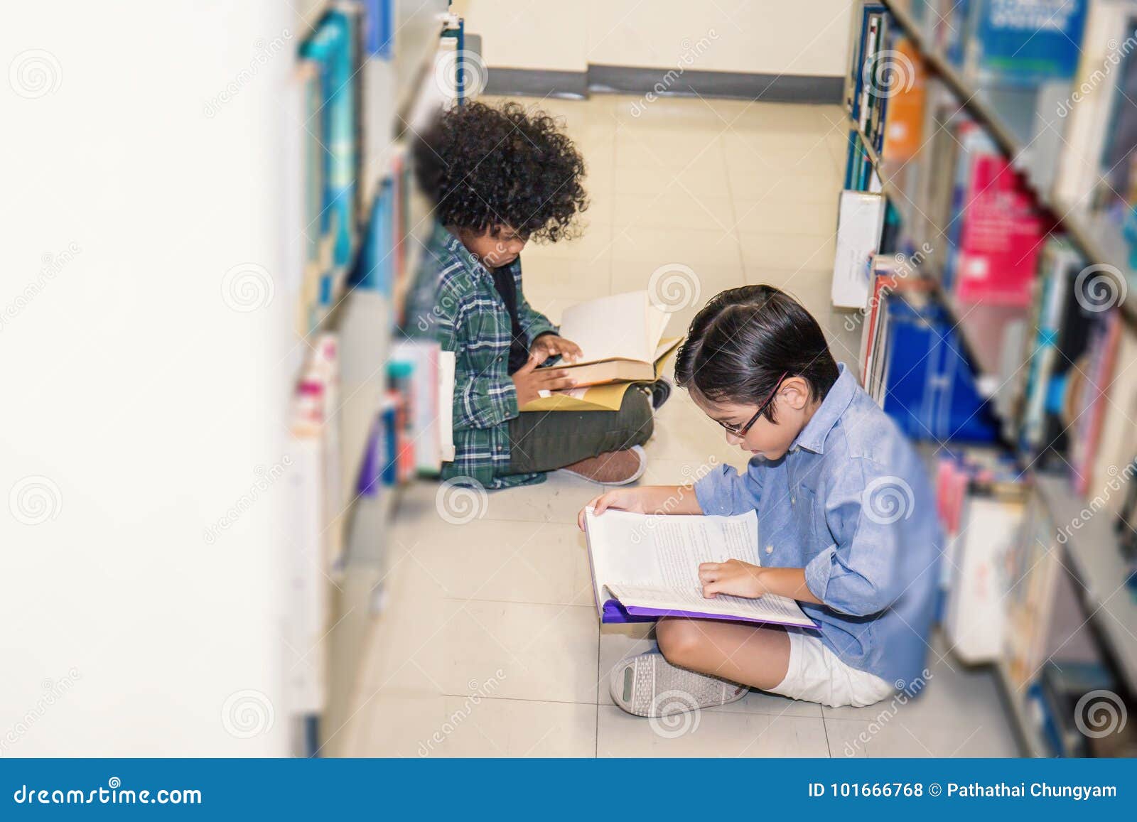 Two Boy Reading on the Library Floor Stock Photo - Image of african ...