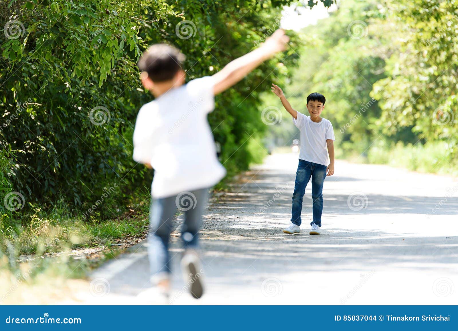 Two boy run in the park stock photo. Image of ecology - 85037044