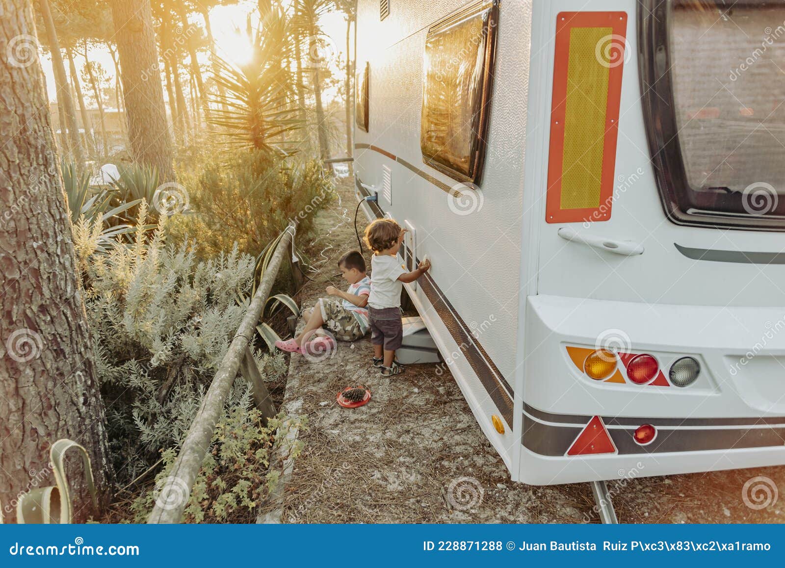 Two Boys in a Caravan Playing in the Nature Stock Photo - Image of ...