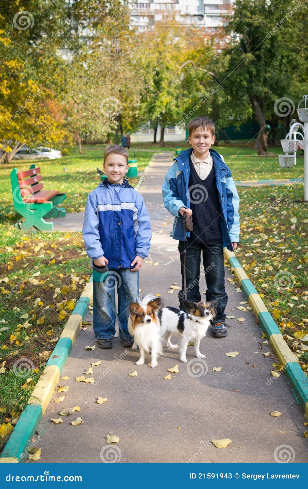 Two boys with dogs stock image. Image of autumn, happiness - 21591943