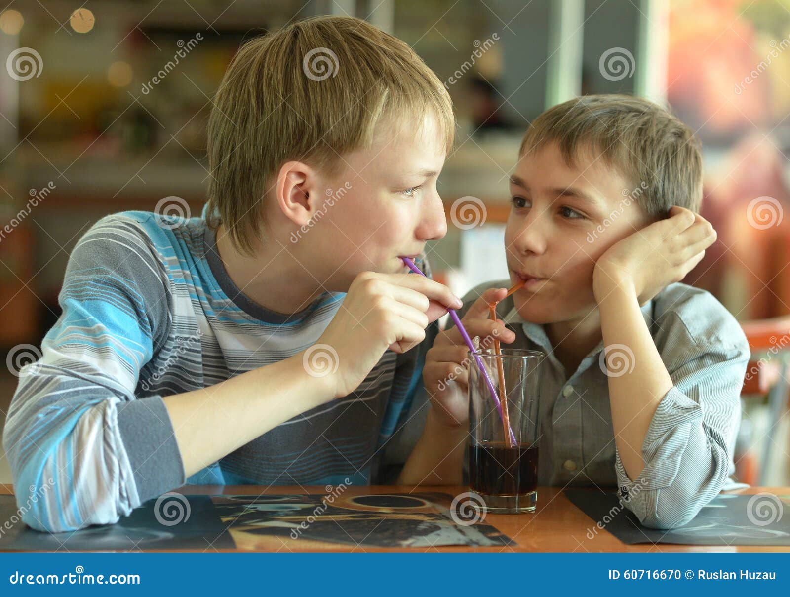 Two boys drinking coke stock photo. Image of coke, kids - 60716670
