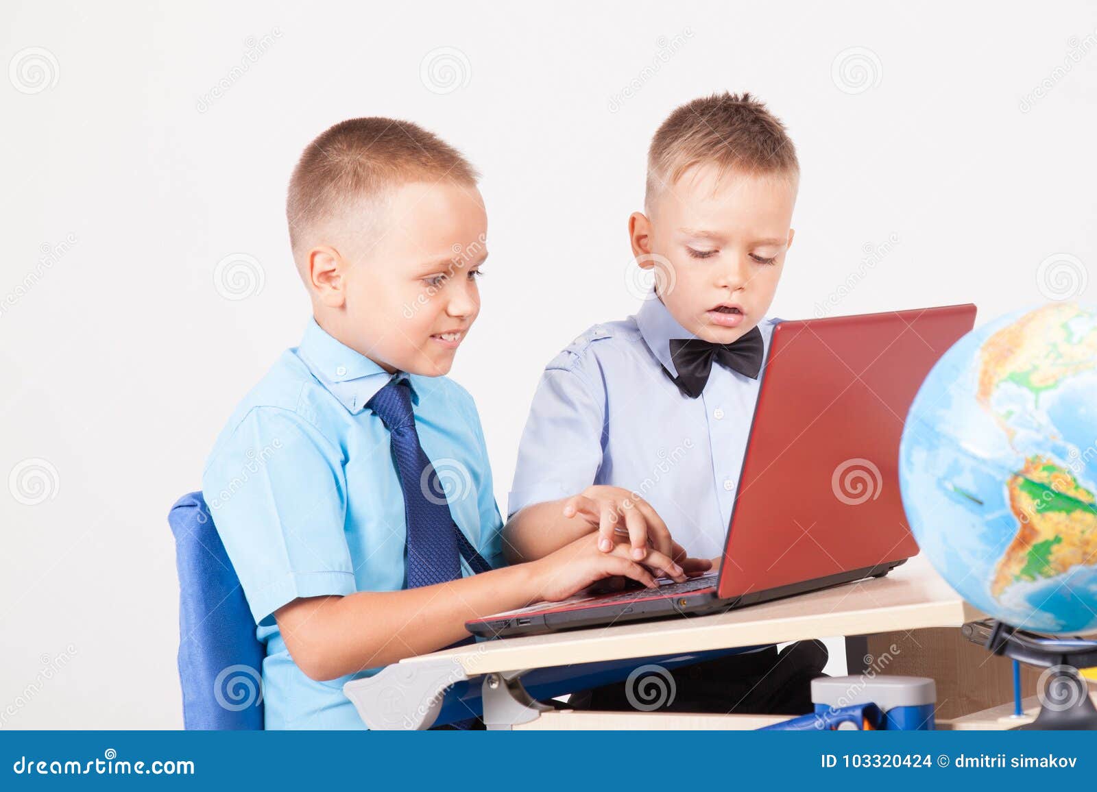 Two Boys Sit at the Computer Training School Stock Photo - Image of ...