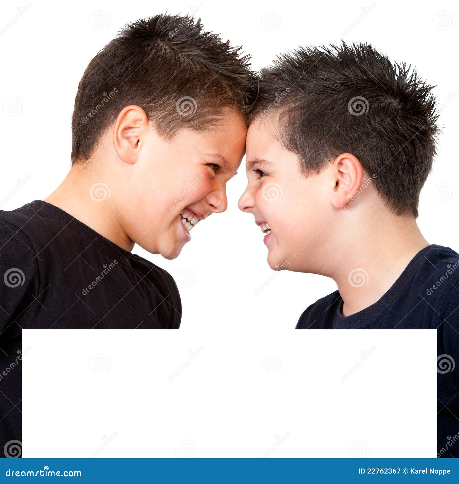 Two Boys with Heads Together Behind Copyspace Stock Image - Image of ...