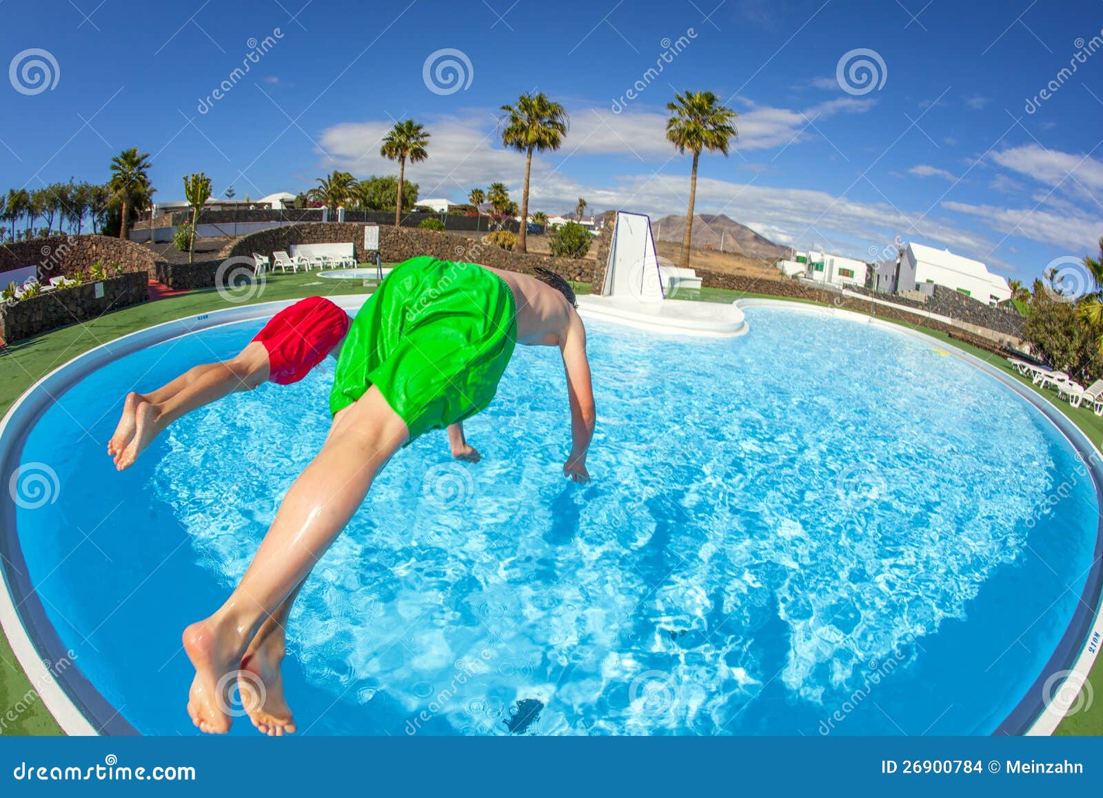 Person Jumping Into Pool