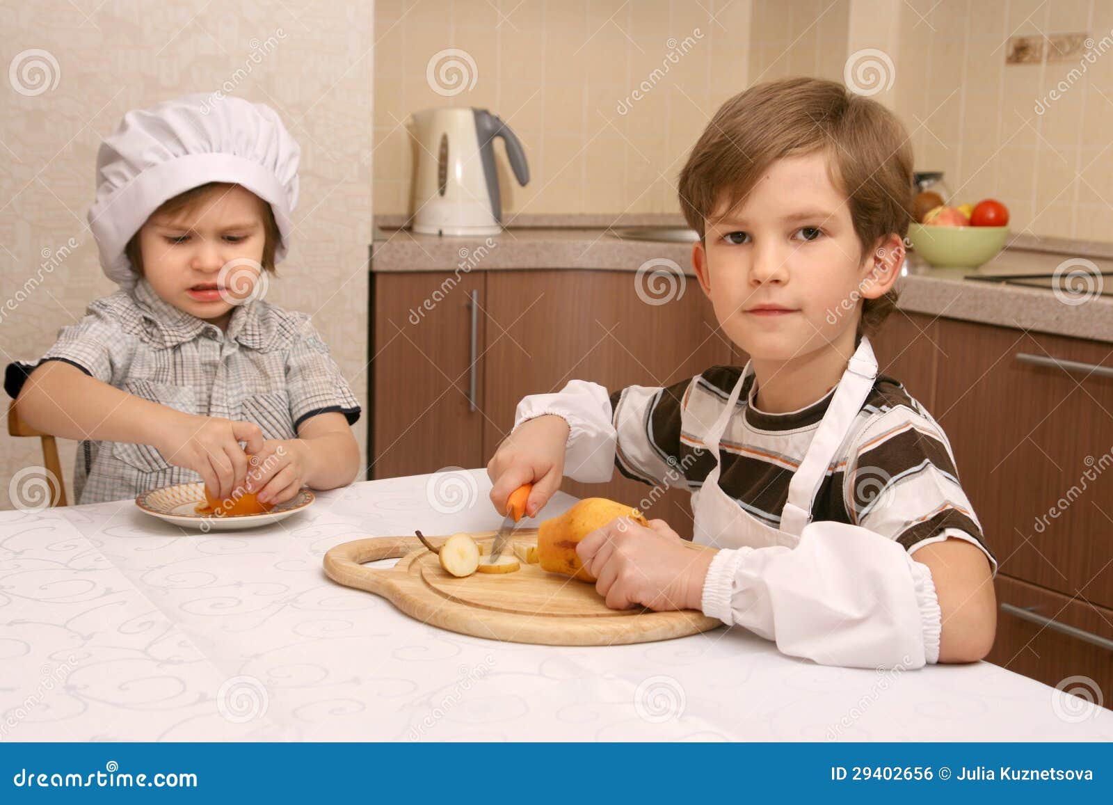 Two boys in kitchen stock photo. Image of table, kettle - 29402656