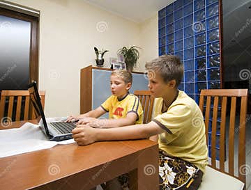 Two Boys and Laptop Computer Stock Photo - Image of library, games: 2814174