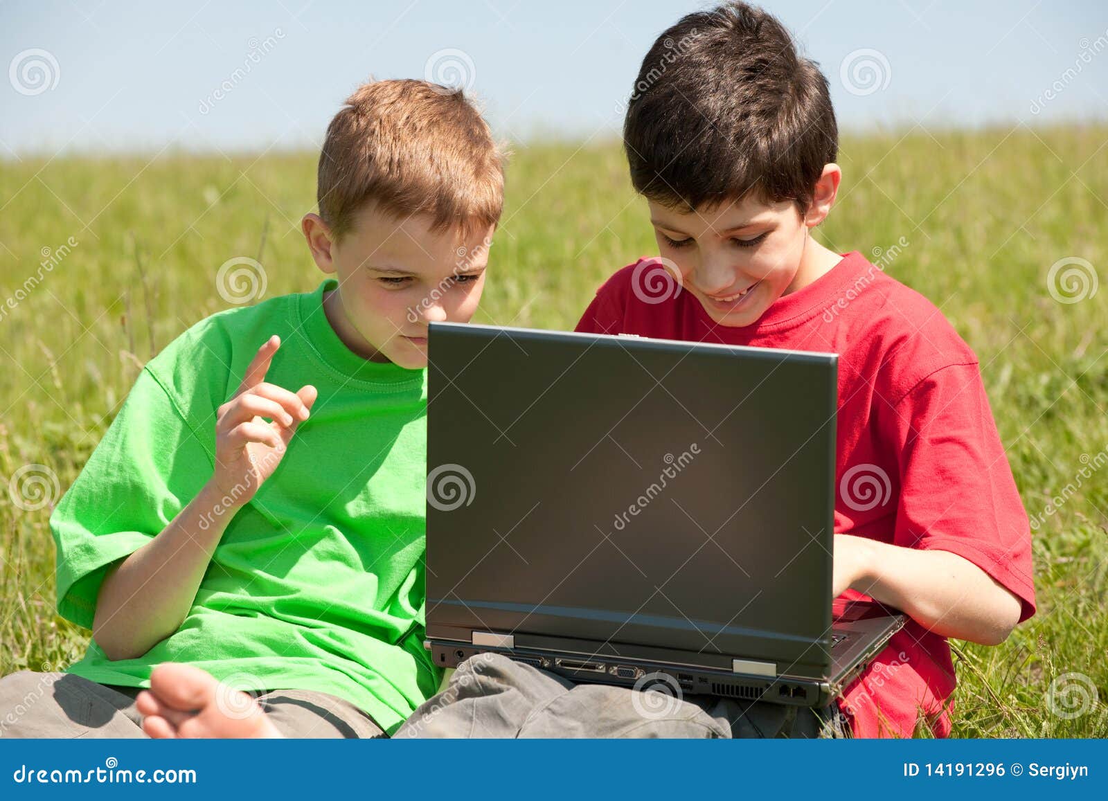 Two Boys with Laptop on the Meadow Stock Photo - Image of feeling ...