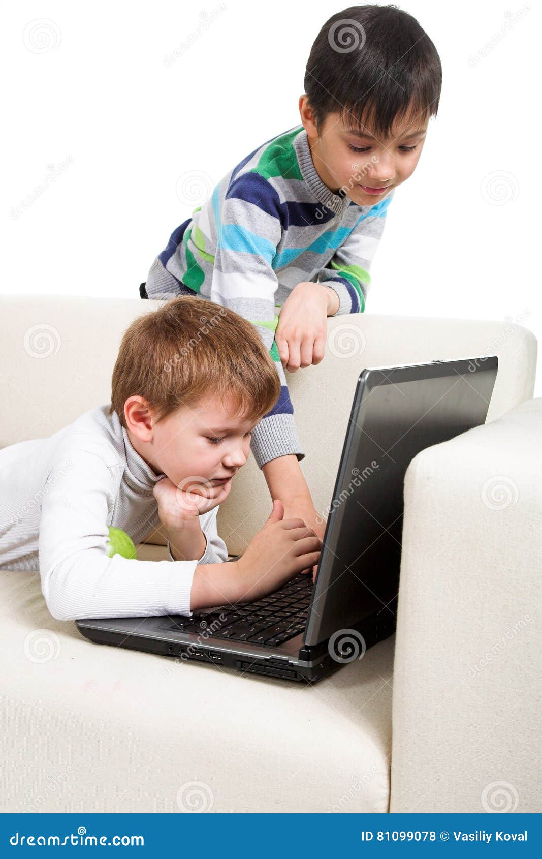 Two boys with laptop stock photo. Image of boys, family - 81099078
